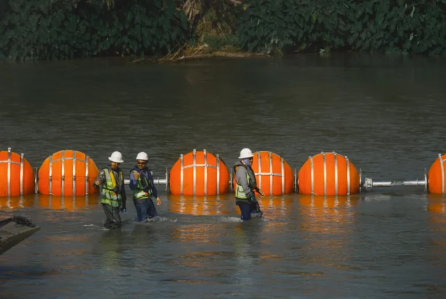 U.S. Sues Texas After Gov. Greg Abbott Declines To Remove Floating ...
